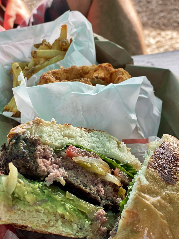 Medium rare perfection: This burger's pink center is giving me more joy than finding a forgotten $20 bill.