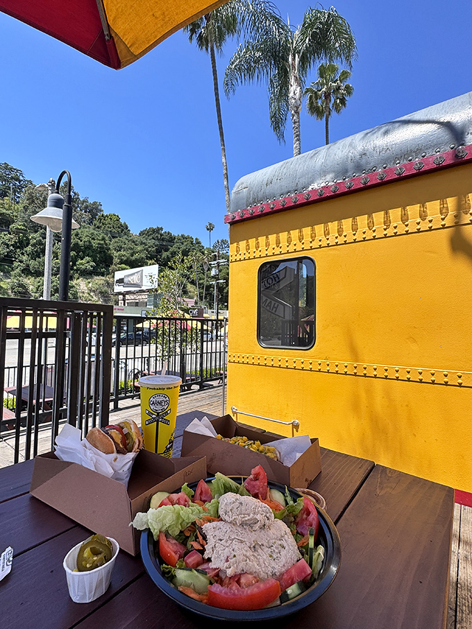 Outdoor seating with a side of California dreamin'. Palm trees, sunshine, and burgers&mdash;is this heaven or just lunch?