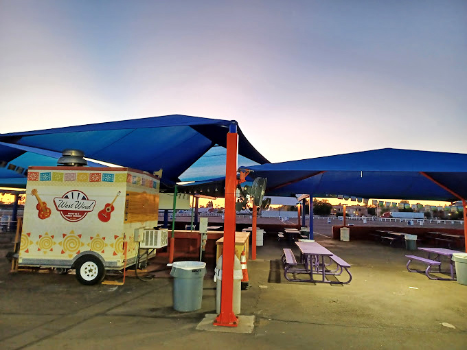 More than just movies! This vibrant setup hints at the drive-in's double life as a daytime market, proving that the show never really stops.