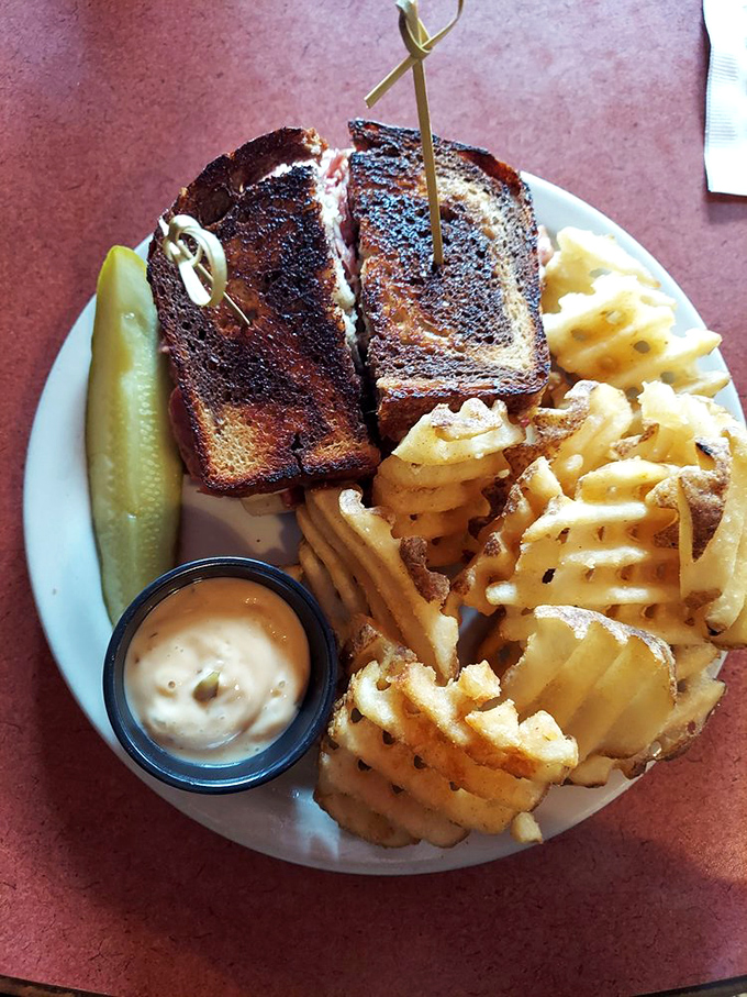 The Reuben sandwich: A towering testament to the magic that happens when corned beef meets sauerkraut. It's deli perfection!