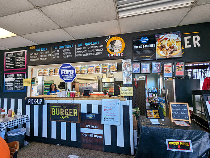 The burger maestros at work! These folks could probably flip patties in their sleep, and we'd still line up for more.