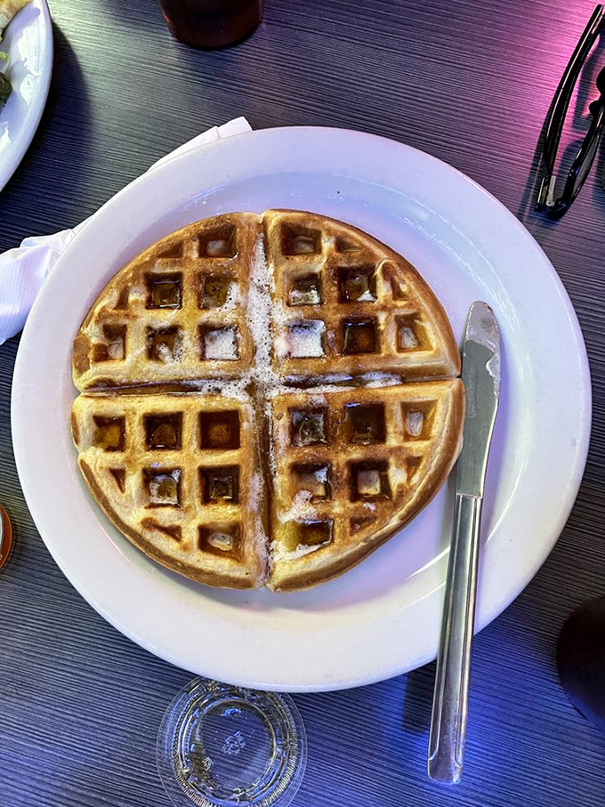 Waffle perfection: crispy on the outside, fluffy on the inside. It's the breakfast equivalent of a mullet - business on top, party in the middle.