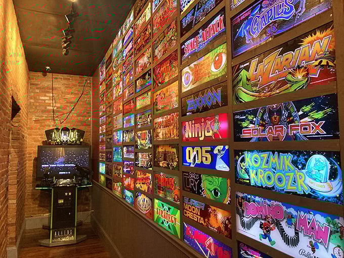A wall of wonders! This luminous display of arcade art is like a stained-glass window for the Church of Retro Gaming.