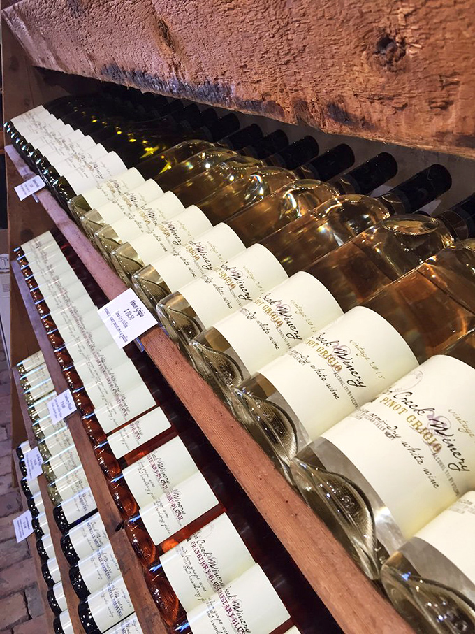 A lineup that would make any sommelier swoon. From crisp whites to bold reds, Cedar Creek's bottles are like a United Nations of wine.