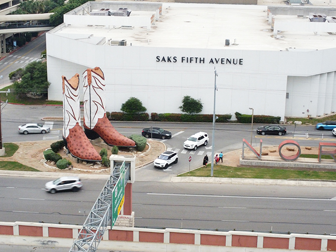 Bird's eye view of bovine-sized boots. From up here, they look like God dropped his favorite pair of cowboy boots and said, "Eh, let's just leave 'em there."