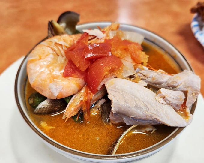 Soup's on! This ahi belly broth is swimming with flavors that'll make your taste buds do the hula.