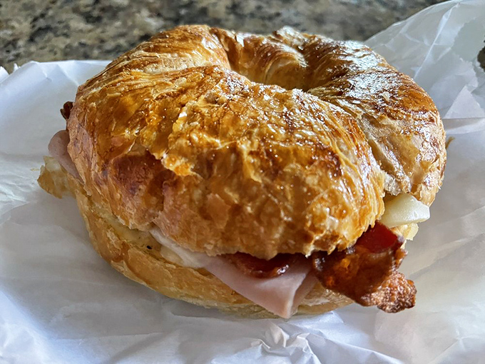 Who says you can't have it all? This breakfast croissant proves that savory and flaky can coexist in perfect harmony.