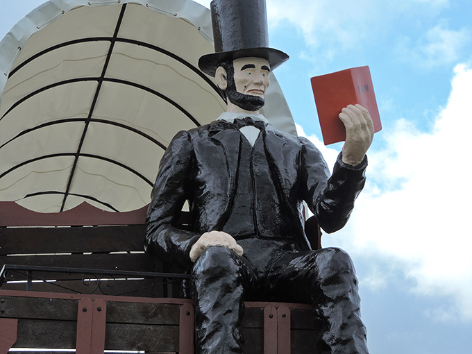 "To read, or not to read?" There's no question for this bookish Abe. His expression says, "I've got a long journey ahead – better make it a good one!"