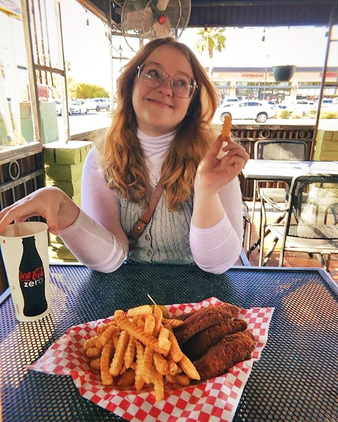 Happy diner, happy life! This scene is proof that sometimes, the best seasoning is a side of pure joy.