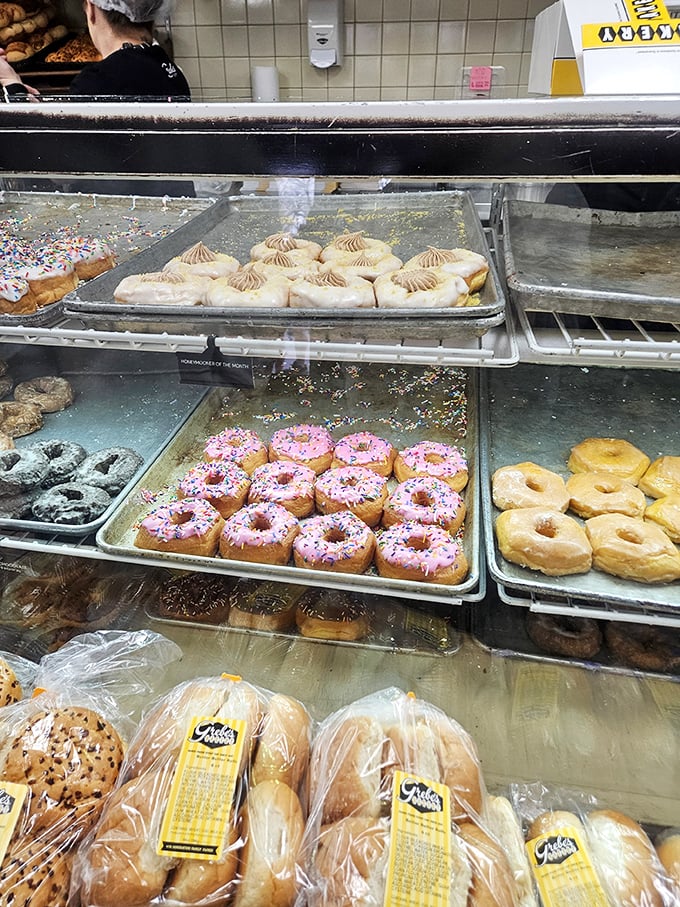 Donuts, and pastries, and cakes, oh my! This display case is the yellow brick road of baked goods, leading straight to dessert nirvana.