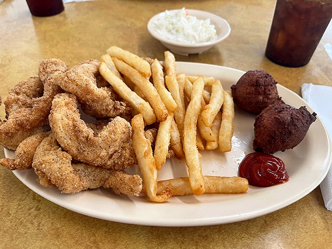 Who says you can't have it all? Crispy fish, golden fries, and mysterious fried spheres of deliciousness. It's a plate that would make Captain Ahab trade in his ship.