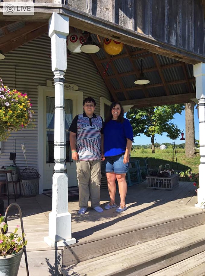 The smiling couple seems right at home, ready to share tales of their grain bin adventure with anyone who'll listen.