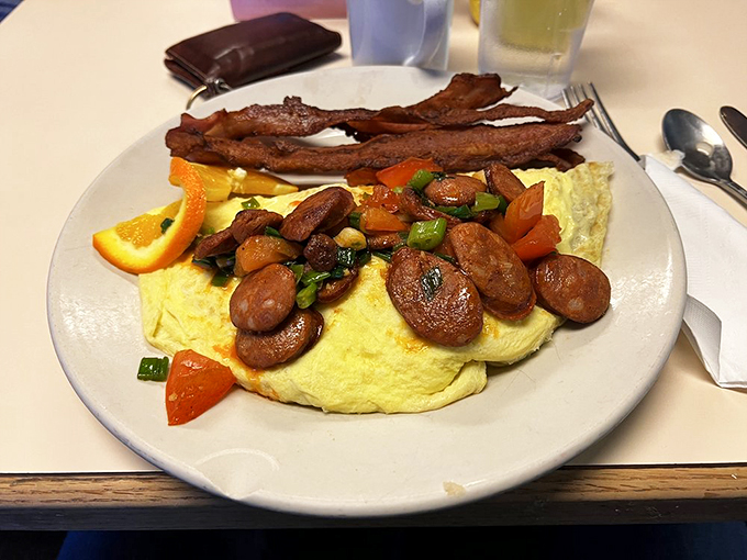 Linguica omelet: Where breakfast meets flavor town. It's like a party in your mouth, and everyone's invited!