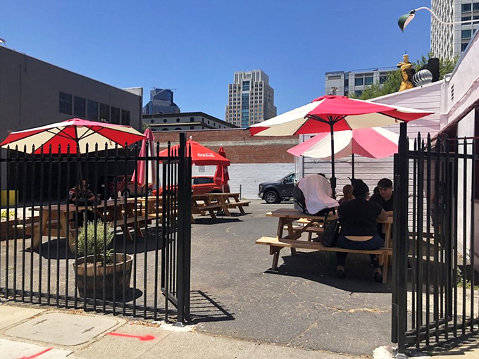 Alfresco dining, diner-style. Who needs a fancy patio when you've got picnic tables, umbrellas, and the intoxicating aroma of burgers on the grill?