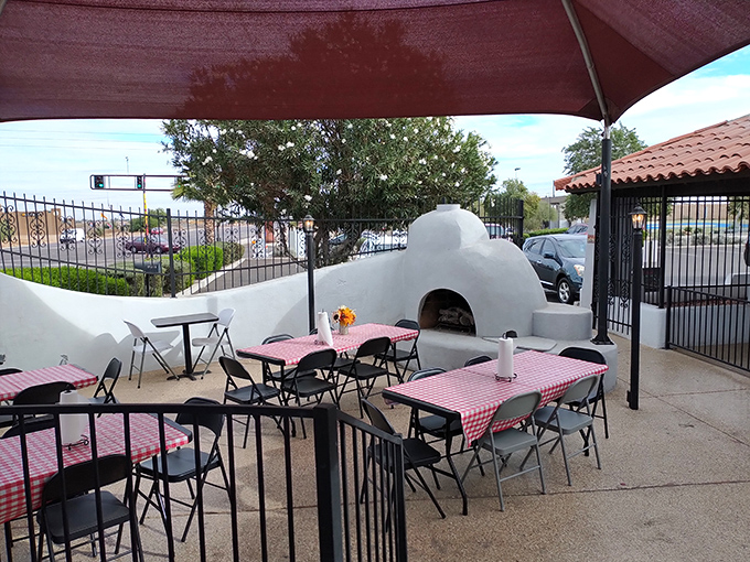 Al fresco dining with a side of Arizona charm. Who knew a parking lot could feel so... romantic? Must be the barbecue in the air.