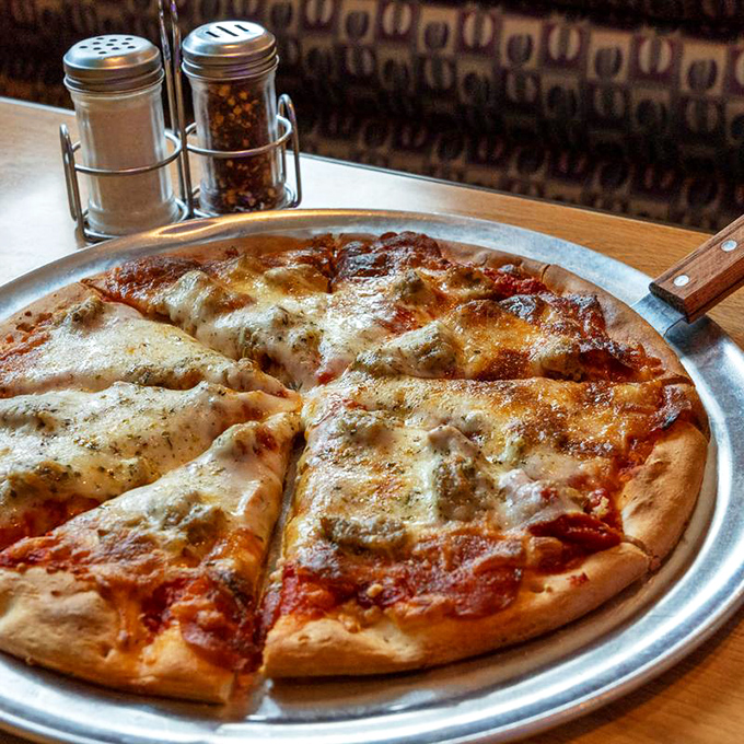 Pizza perfection! This pie proves The Brass Rail isn't just a one-trick pony &ndash; it's a full-fledged flavor circus.