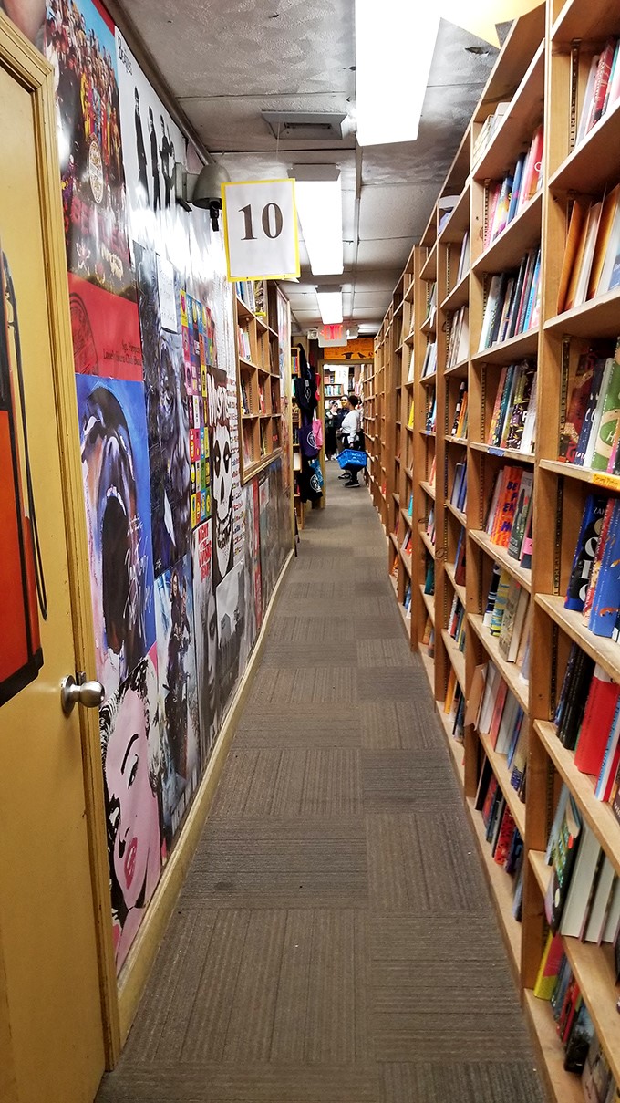 Down the rabbit hole we go! This narrow passage might lead to Narnia, or just more books. Either way, it's an adventure.