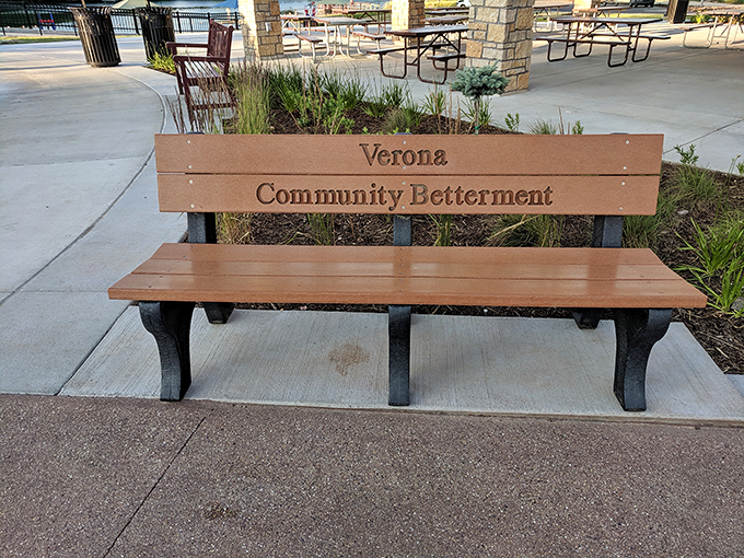 Take a load off on the 'Verona Community Betterment' bench. It's not just a seat, it's a mission statement with armrests.