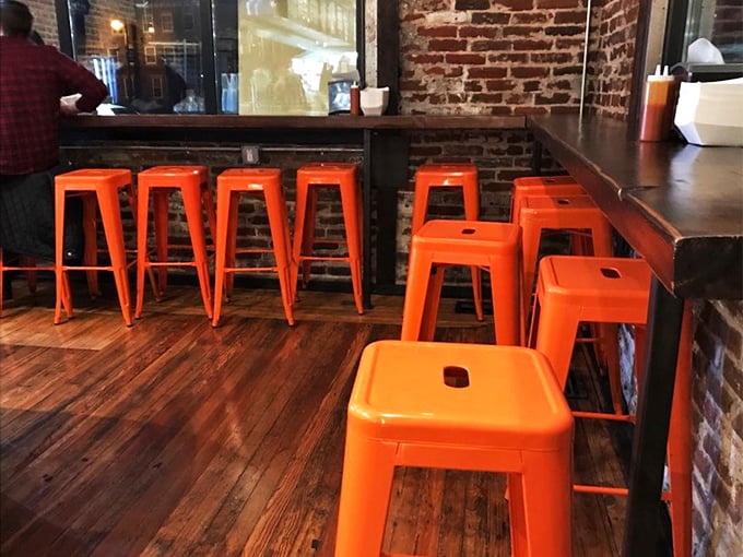 Pull up a seat and stay awhile! These vibrant orange stools are like little thrones for chicken royalty (that's you, by the way).