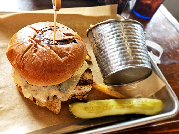 This isn't just a sandwich, it's an engineering marvel. Stacked higher than a Jenga tower, it's a delicious balancing act of flavors.