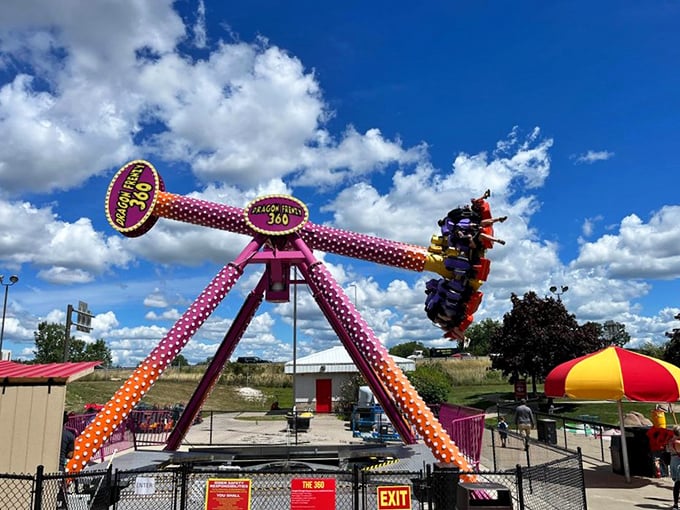 Hold onto your hats (and lunch)! This twirling terror, aptly named Dragon Frenzy, is where thrill-seekers test their mettle. It's like a washing machine on steroids.