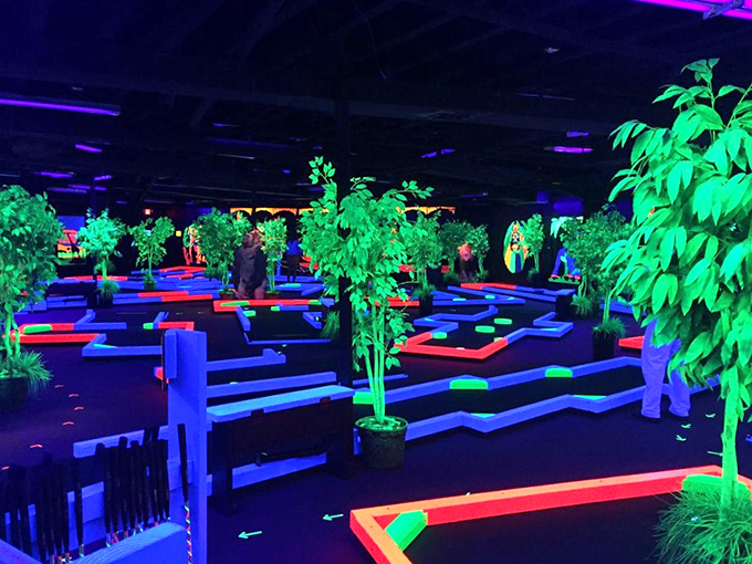 The golf course is a labyrinth of luminous fun. It's like Alice in Wonderland took a detour through a laser tag arena!