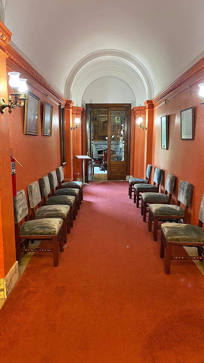 Red carpet treatment, castle-style. This hallway whispers tales of bygone elegance with every creaky floorboard.