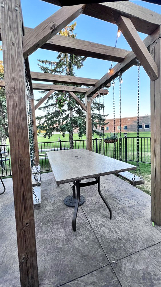 Dine al fresco in style! This charming patio setup is the perfect spot for a meal.