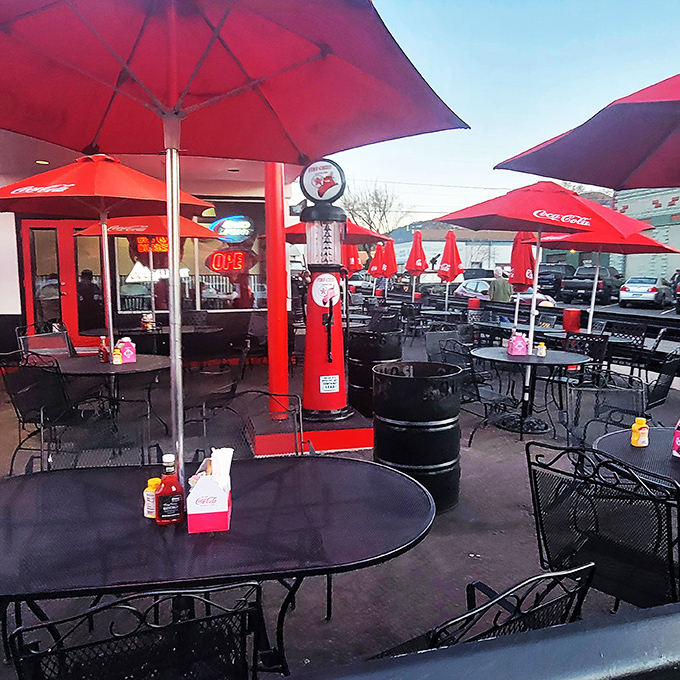 Outdoor seating that's got more red than a sunburned tourist at the Grand Canyon. Perfect for people-watching and pretending you're in a retro sitcom.