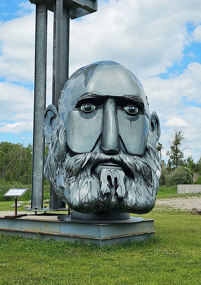 Talk about a close shave! This metallic mug looks like he's been using the same razor since the lumber boom days.