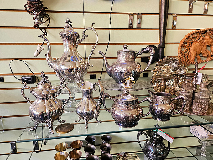 Tea time with a silver lining! This collection of ornate teapots and servers is fit for a royal garden party or a very fancy Mad Hatter.