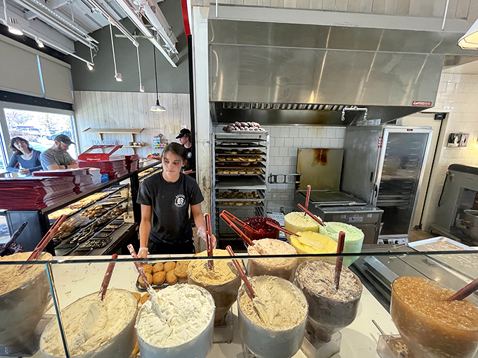 Behind the scenes of deliciousness! Beiler's staff are the unsung heroes of the doughnut world, crafting edible joy one pastry at a time.