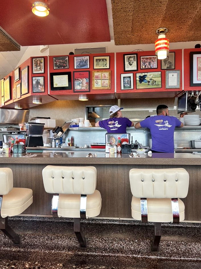 The unsung heroes of Pann's, slinging hash and happiness in equal measure. These culinary maestros could probably flip an omelette blindfolded &ndash; but let's not test that theory.