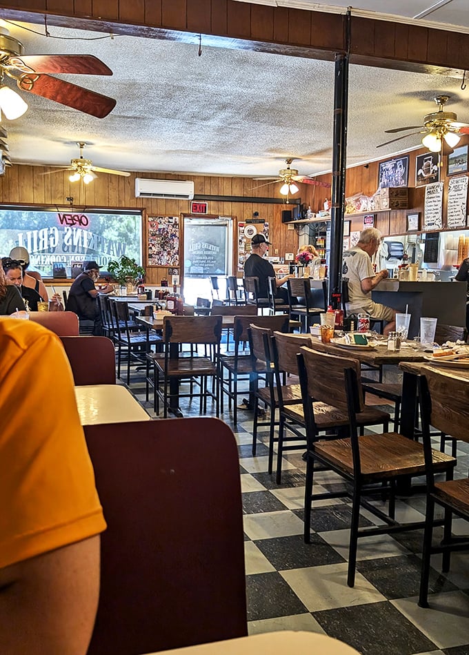 A checkerboard floor and wood-paneled walls set the stage for culinary performances that would make Elvis say, "Thank you, thank you very much."