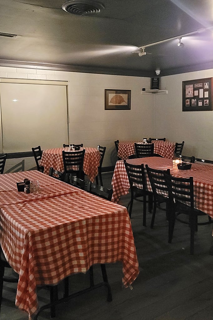 Red and white gingham as far as the eye can see. It's like a picnic decided to put down roots and become a restaurant.