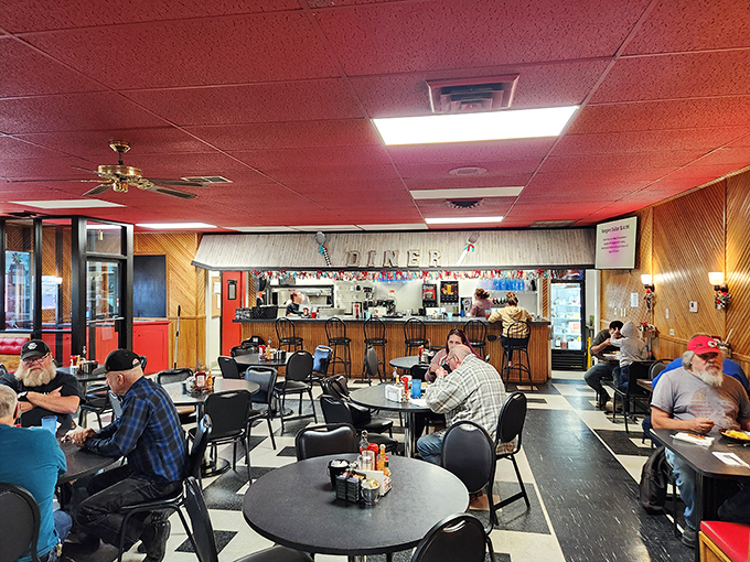 Red chairs, checkered floors, and enough hometown charm to fill Mount Rushmore. This diner's atmosphere is as comforting as a warm slice of apple pie.
