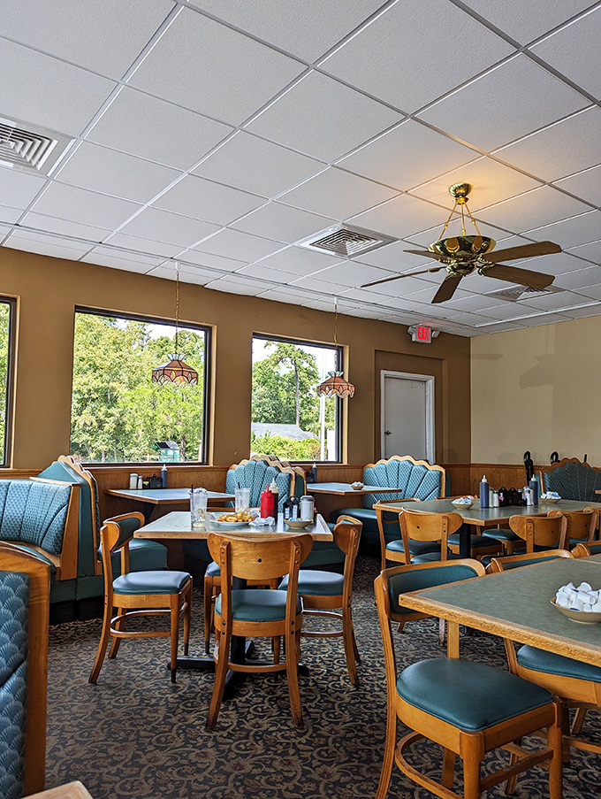 Tiffany lamps cast a warm glow over inviting tables. It's not just a meal; it's a morning sanctuary where pancakes reign supreme.