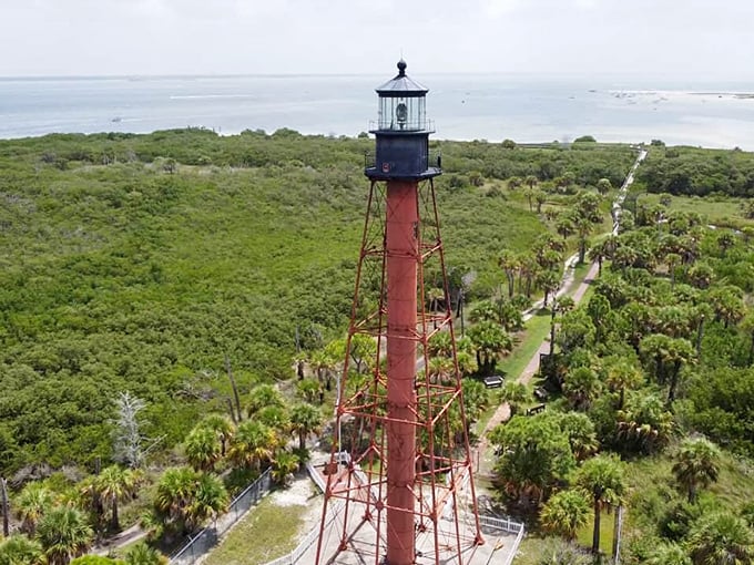 Island getaway with a tall tale: Anclote Key Lighthouse stands proud, a solitary sentinel in a sea of blue.