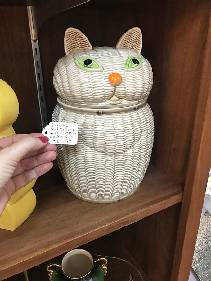 The cat's meow of cookie jars! This feline container is purr-fect for storing treats or just adding a whimsical touch to your kitchen.