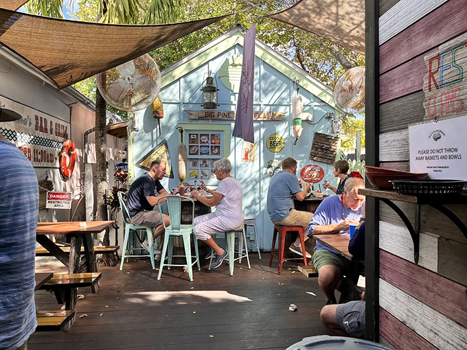 Happy diners in their natural habitat! At DJ's, every meal feels like a laid-back beach party, minus the sand in your shorts.