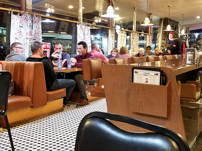 Booth buddies unite! Goldie's dining room is buzzing with more energy than a Beach Boys concert. Can you feel the good vibrations?