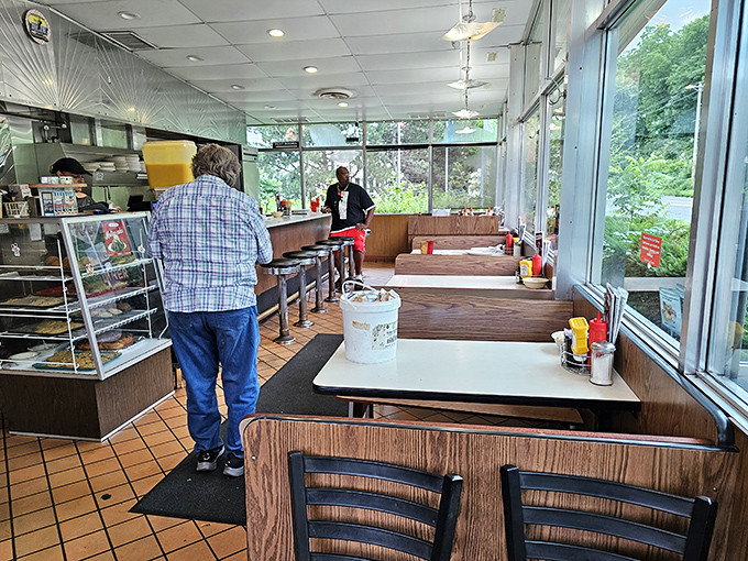 Welcome to the heart of Mickey's, where strangers become friends and calories don't count. It's like Cheers, but with better pancakes.