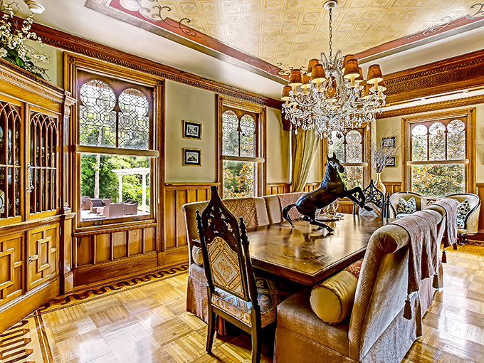 Dinner is served... with a side of grandeur. This dining room could host a royal feast or a lively game of Clue.