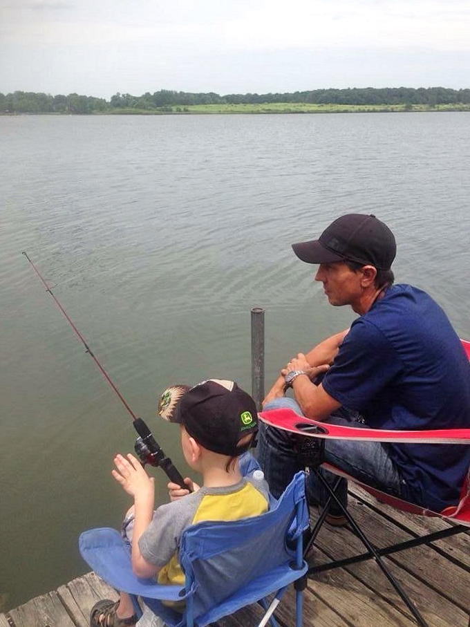 Father-son bonding, fishing edition. Creating memories one cast at a time. Who needs Wi-Fi when you've got this?
