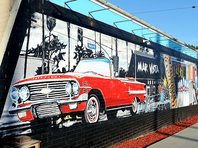 Who needs a red carpet when you've got this groovy mural? It's like the '60s and street art had a beautiful baby.