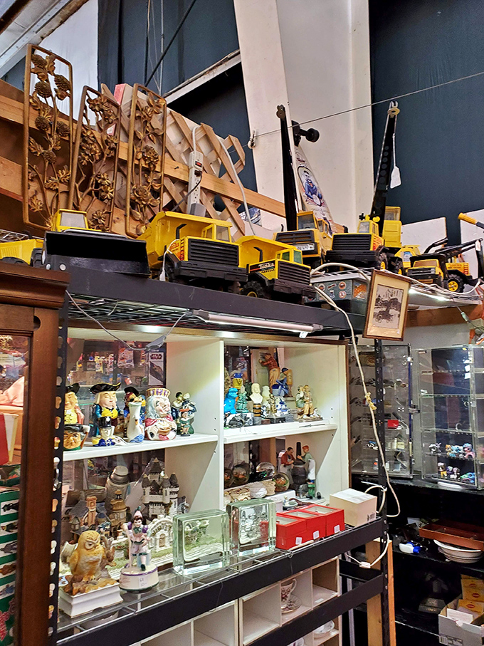 From toy trucks to tchotchkes, this booth's got it all! It's like your grandpa's attic and a souvenir shop had a beautiful baby.