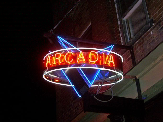 Arcadia calling! This neon sign doesn't just light up the night; it beckons you into a world where the 80s never ended.