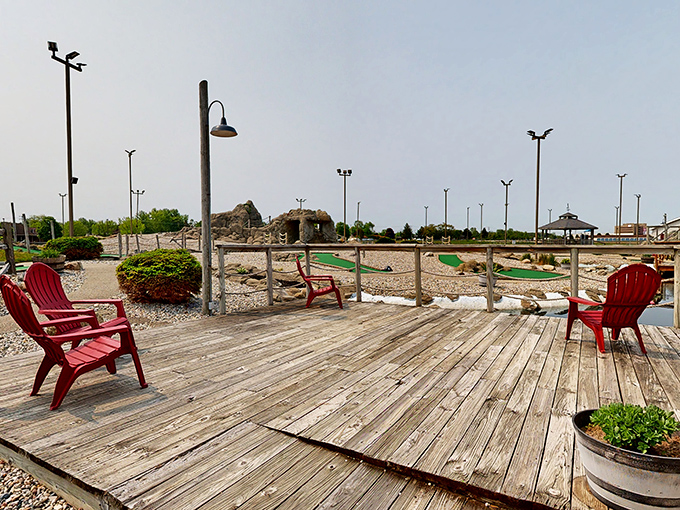Take a load off on this charming deck. With views of the mini-golf course, it's the perfect spot to rest your feet and plot your putt-putt strategy. Just don't let the scenery distract you from your game!