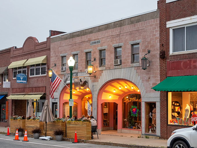 Provender's pink arches beckon like a culinary hug, promising comfort food with a side of small-town hospitality.