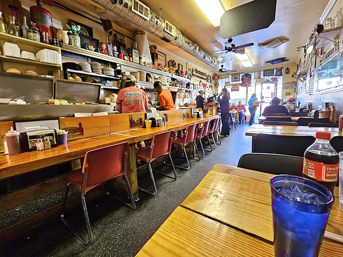 Where the magic happens! The Grill's staff work their culinary wizardry, turning simple ingredients into pure comfort food gold.